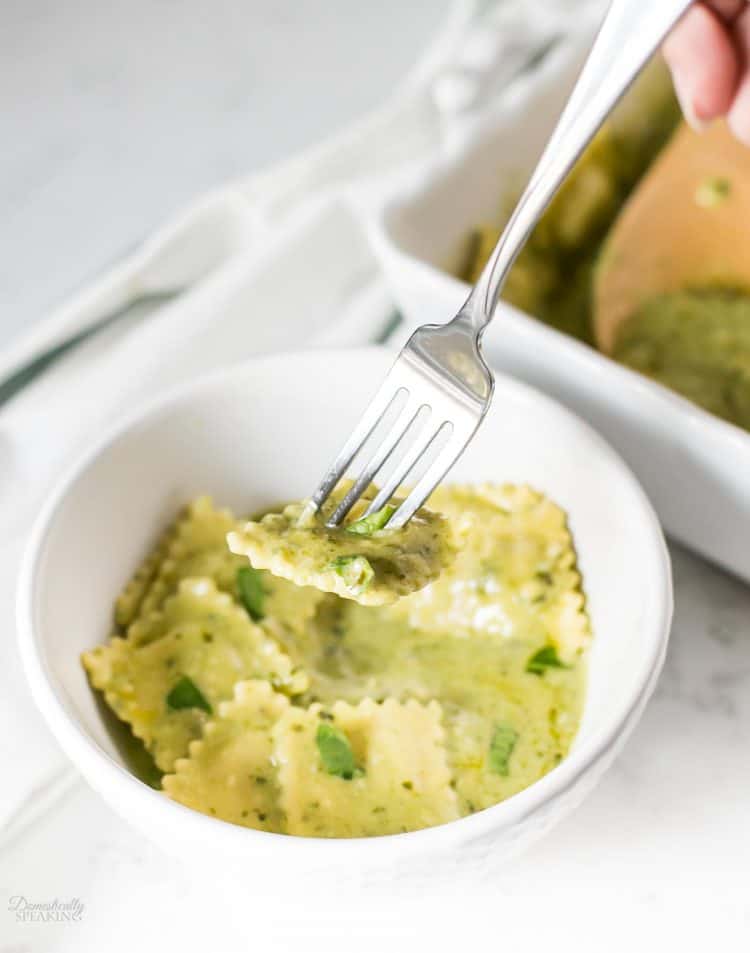 Baked Ravioli With Pesto Creamy Sauce Domestically Speaking