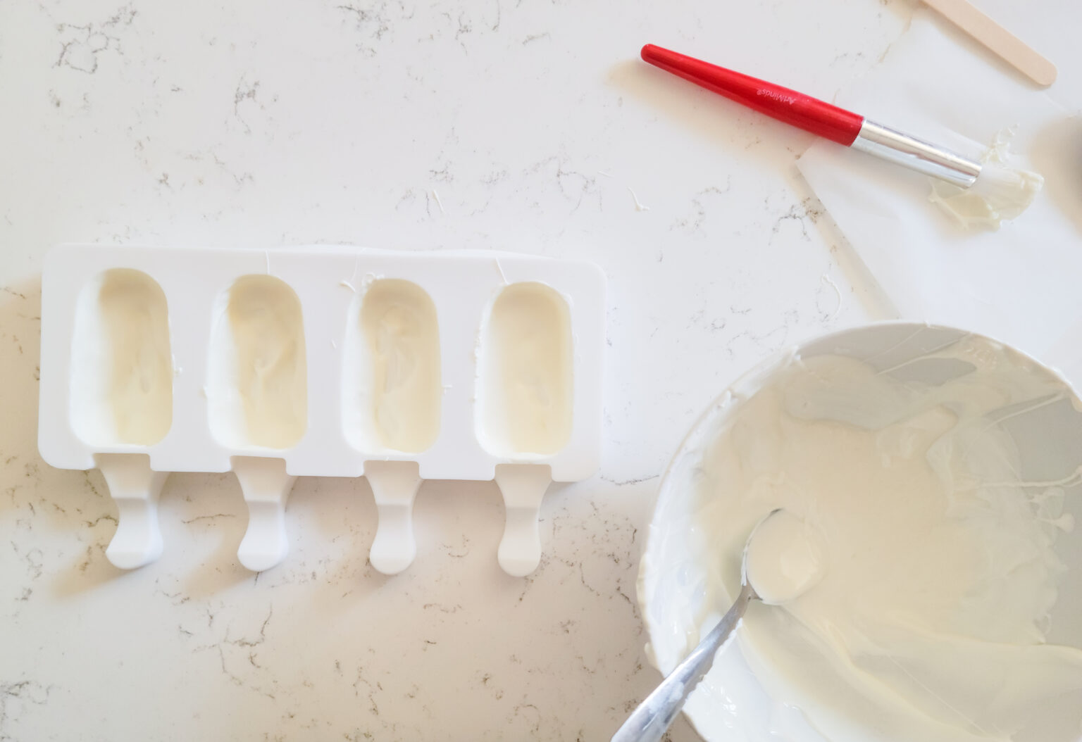 How to Make Spring Easter Cakesicles - Domestically Speaking