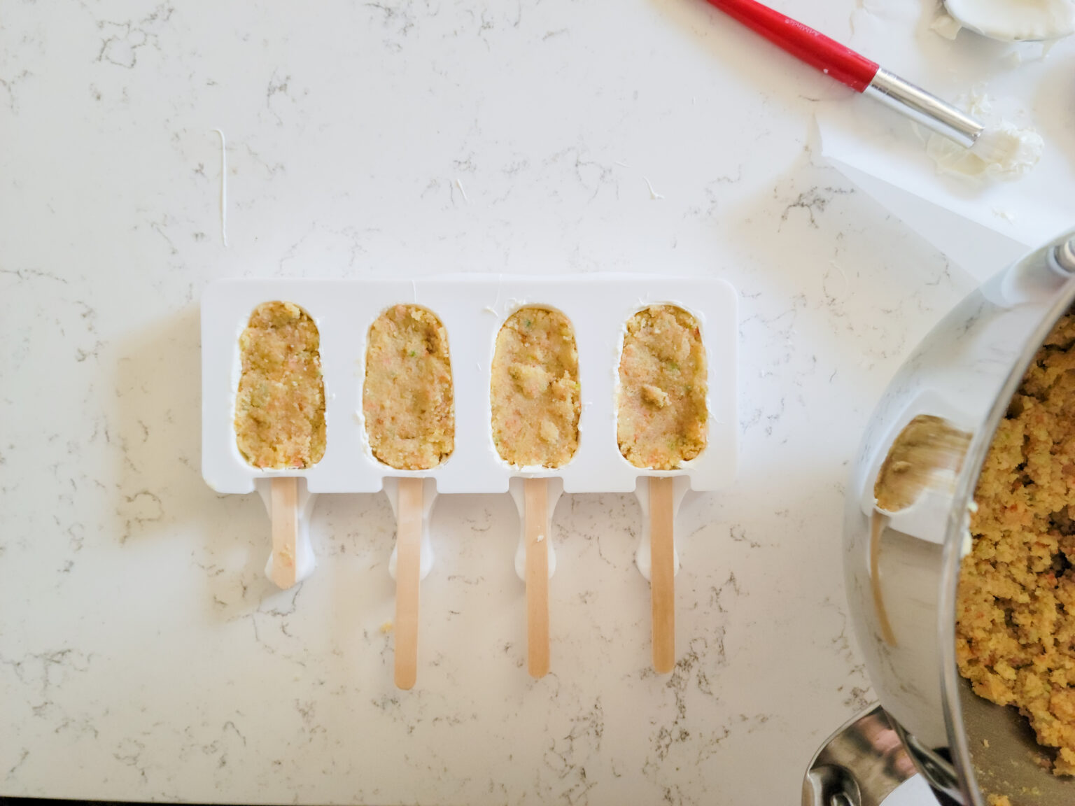 How to Make Spring Easter Cakesicles - Domestically Speaking